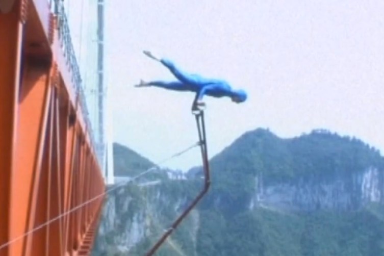 WATCH: Death-Defying Daredevil Performs Stunts from Towering China ...