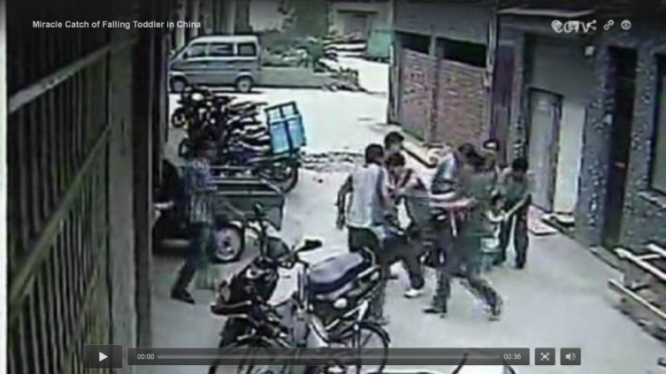Group of Men Catch a Toddler Falling From a Building in China | TIME.com