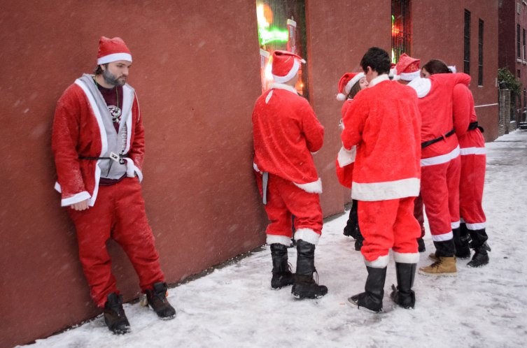 SantaCon 2013: Santas Storm Manhattan Streets, Drinking and Fighting ...