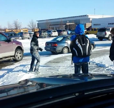 Dad Picks Up Kids From School and Laughs as Students Slip on Ice | TIME.com
